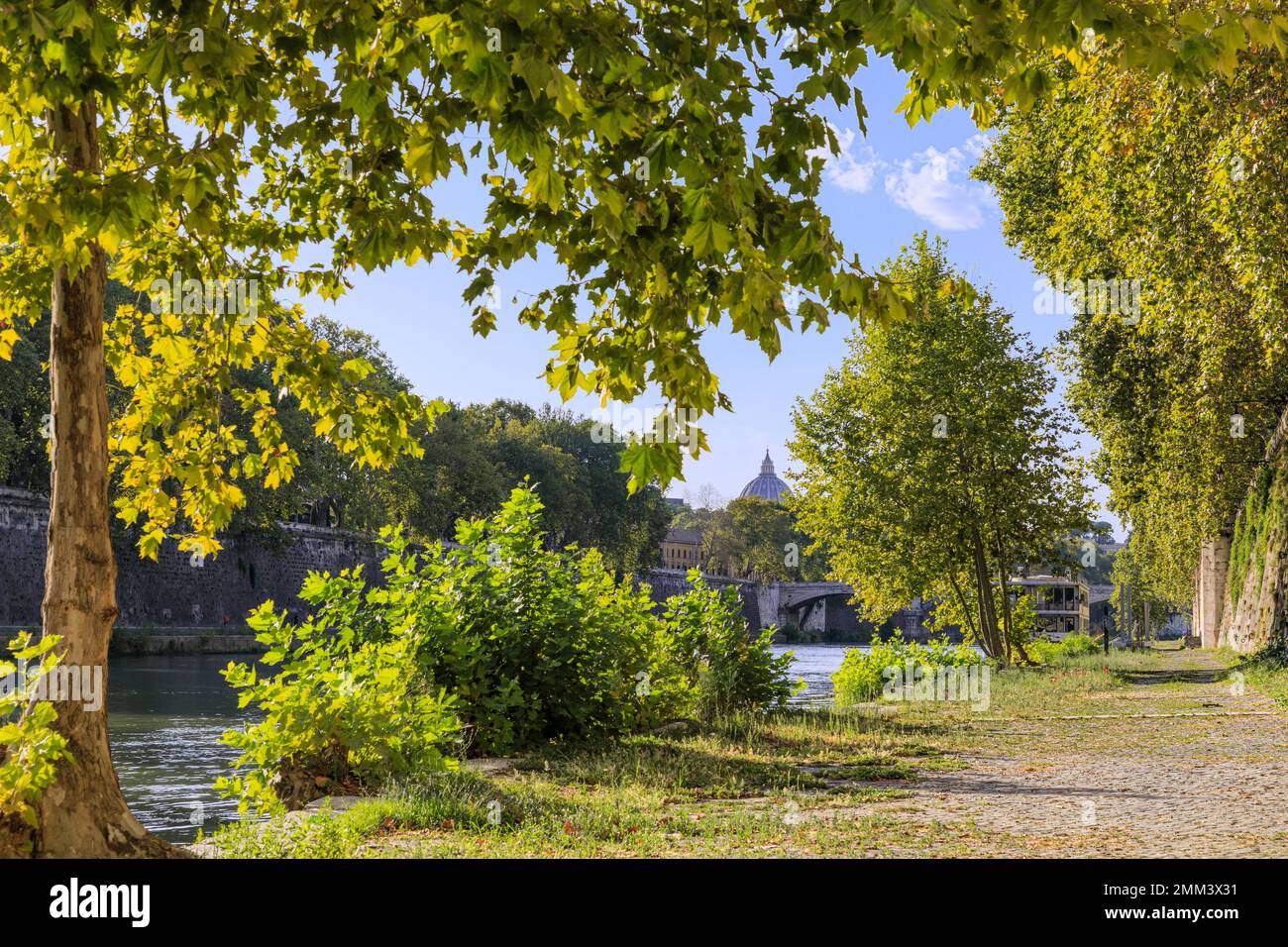 Typical view of the Tiber Waterfront in Rome, Italy. In the distance ...