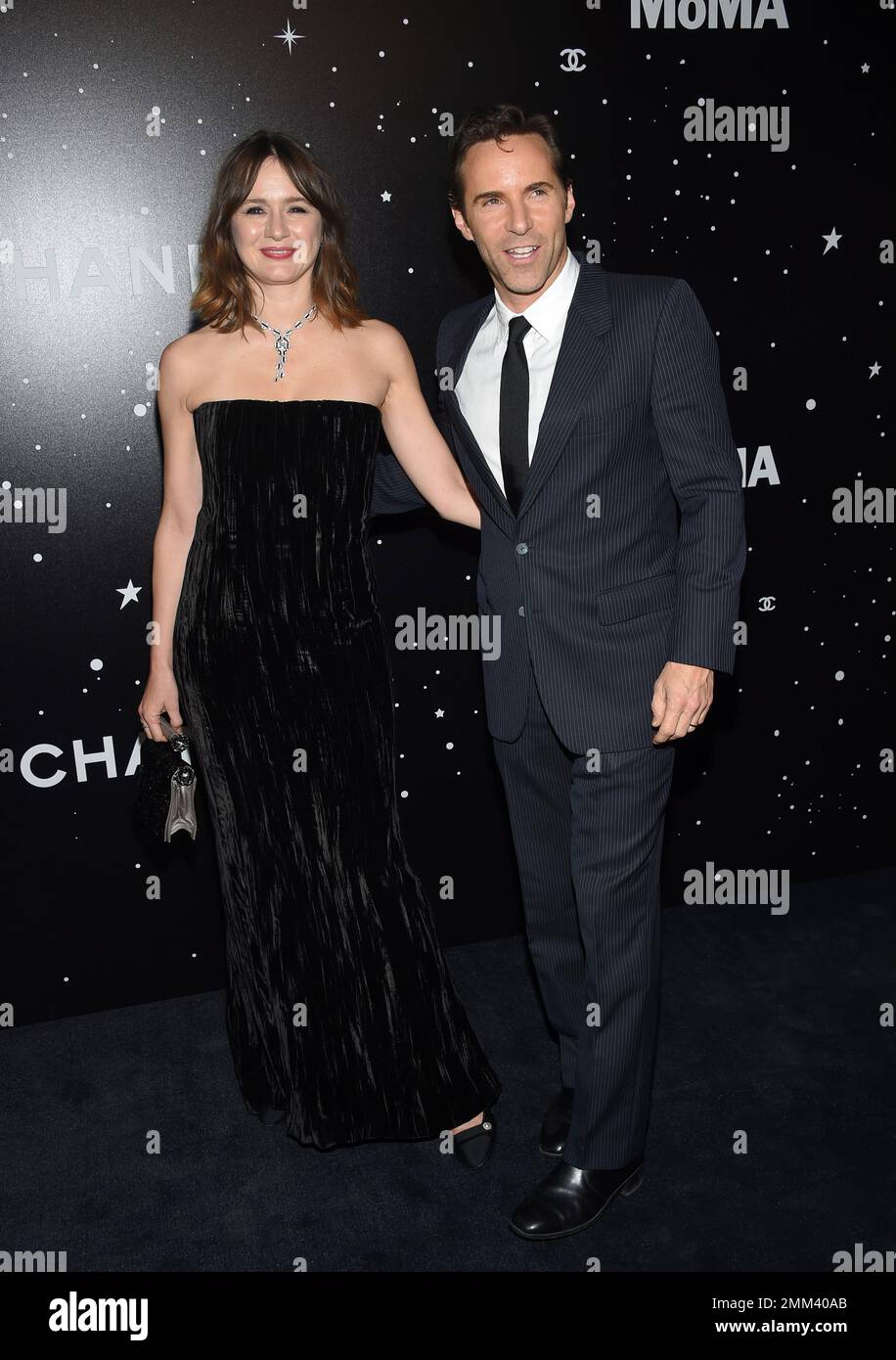 Actors Emily Mortimer, left, and husband Alessandro Nivola attend the ...