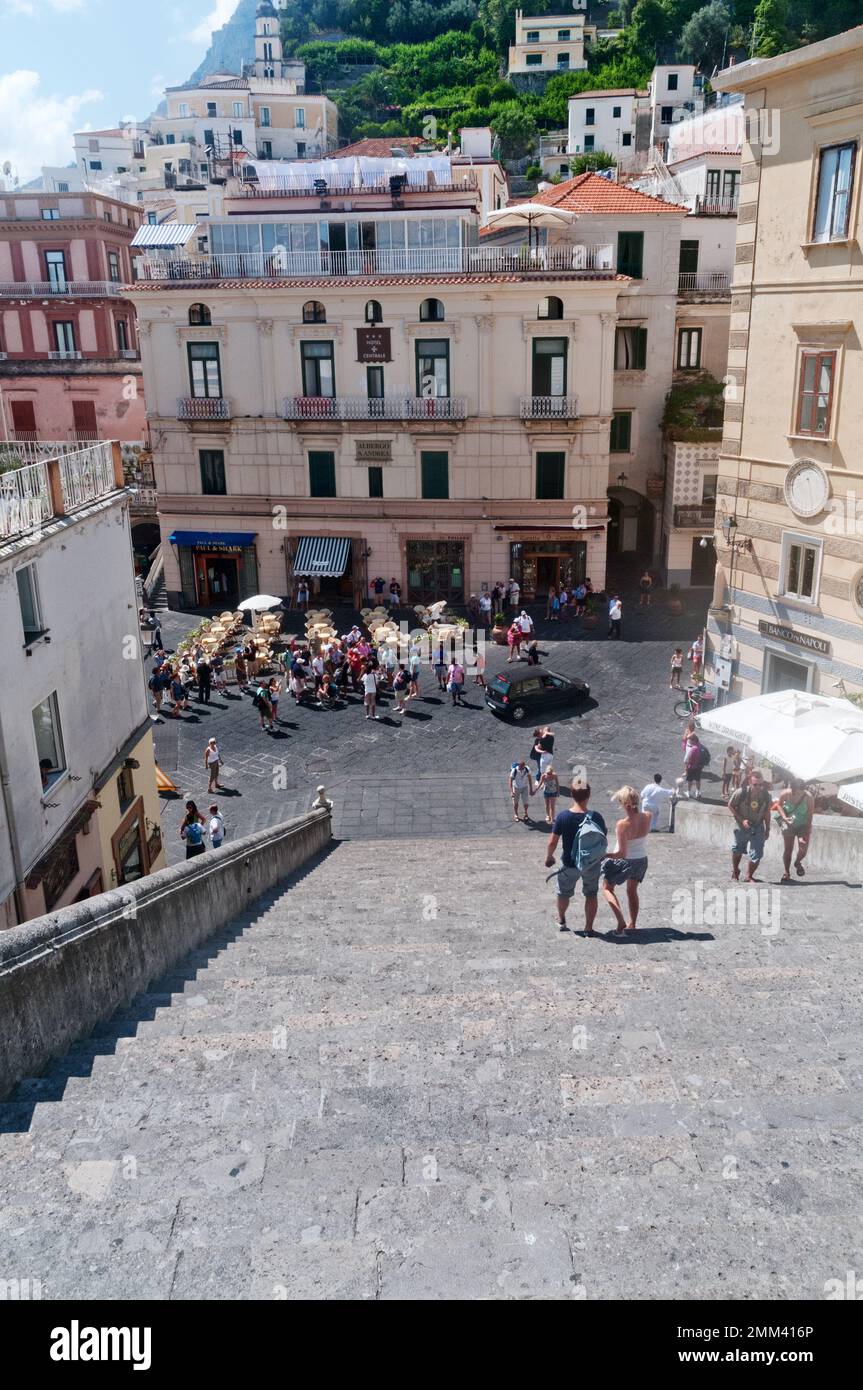 Tourists walking on the steps to the Cathedral of St Andrew, Amalfi ...
