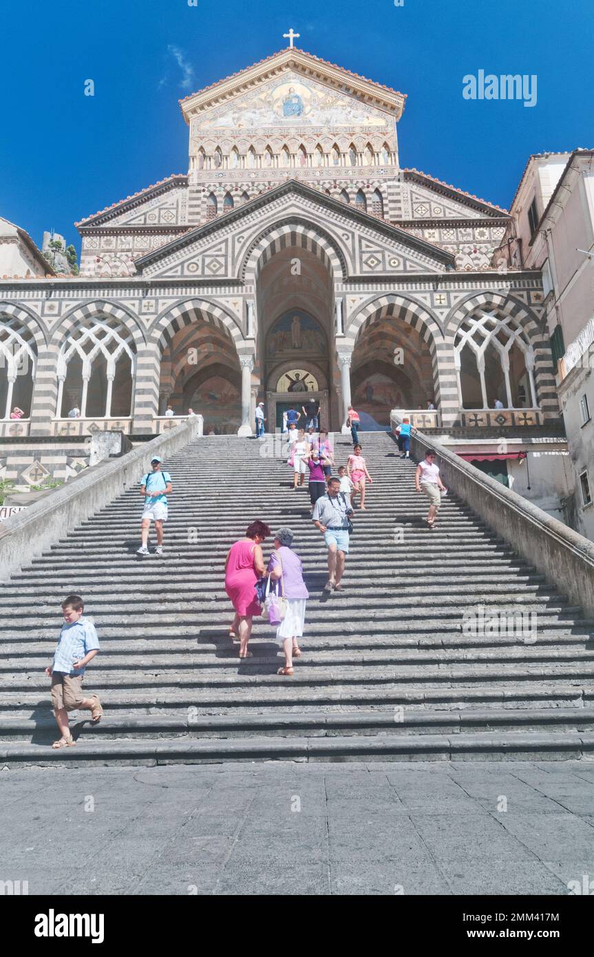 Tourists walking up the steps to the Cathedral of St Andrew, Amalfi ...