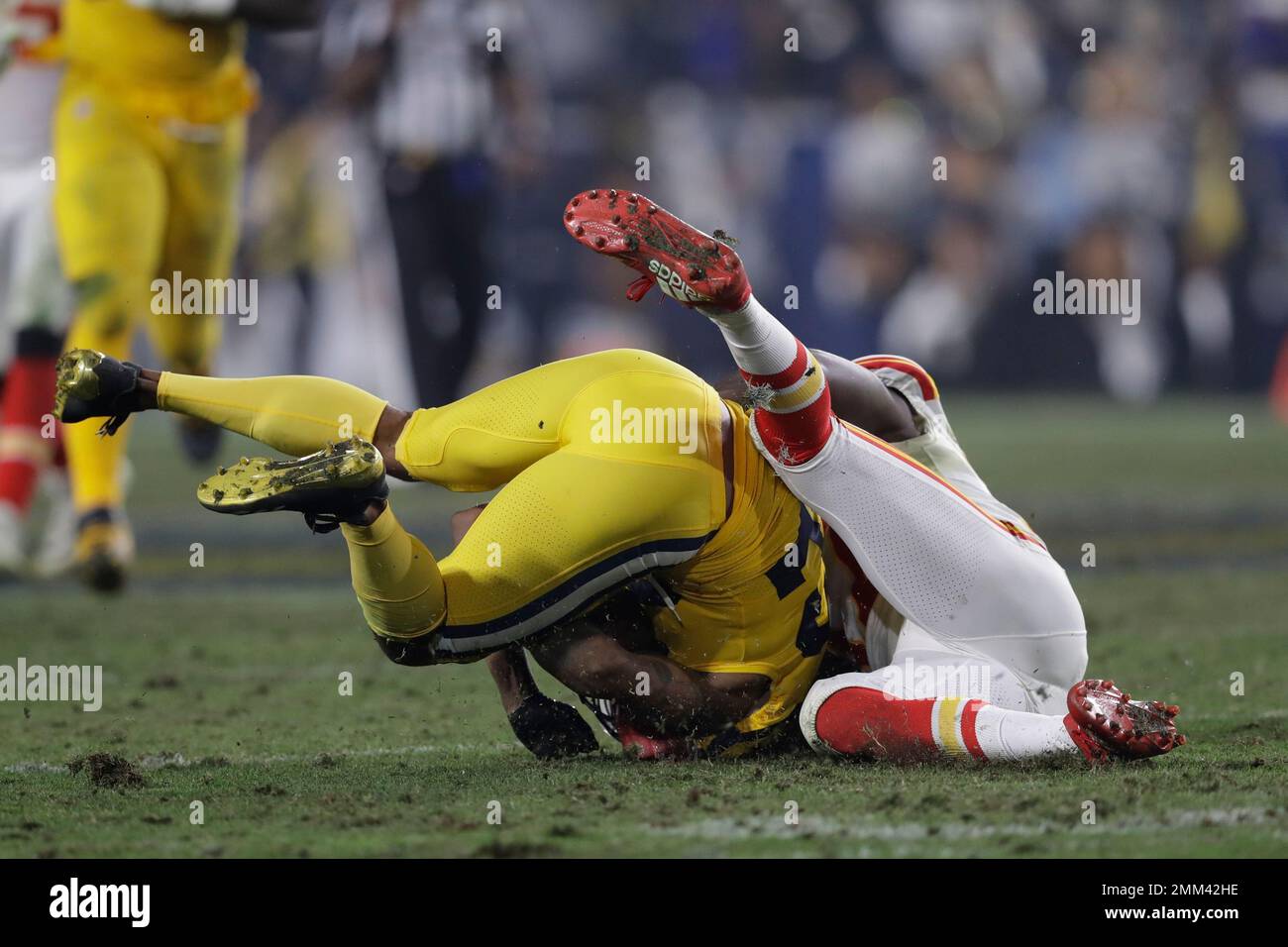 Los Angeles Rams cornerback Marcus Peters, left, comes down with an ...