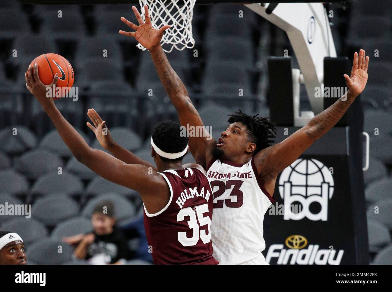 Mississippi State's Aric Holman (35) shoots around Arizona State's ...