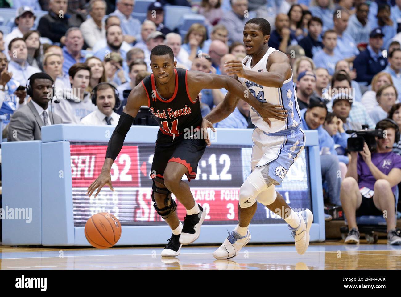 St. Francis guard Isaiah Blackmon (11) and North Carolina guard Kenny ...
