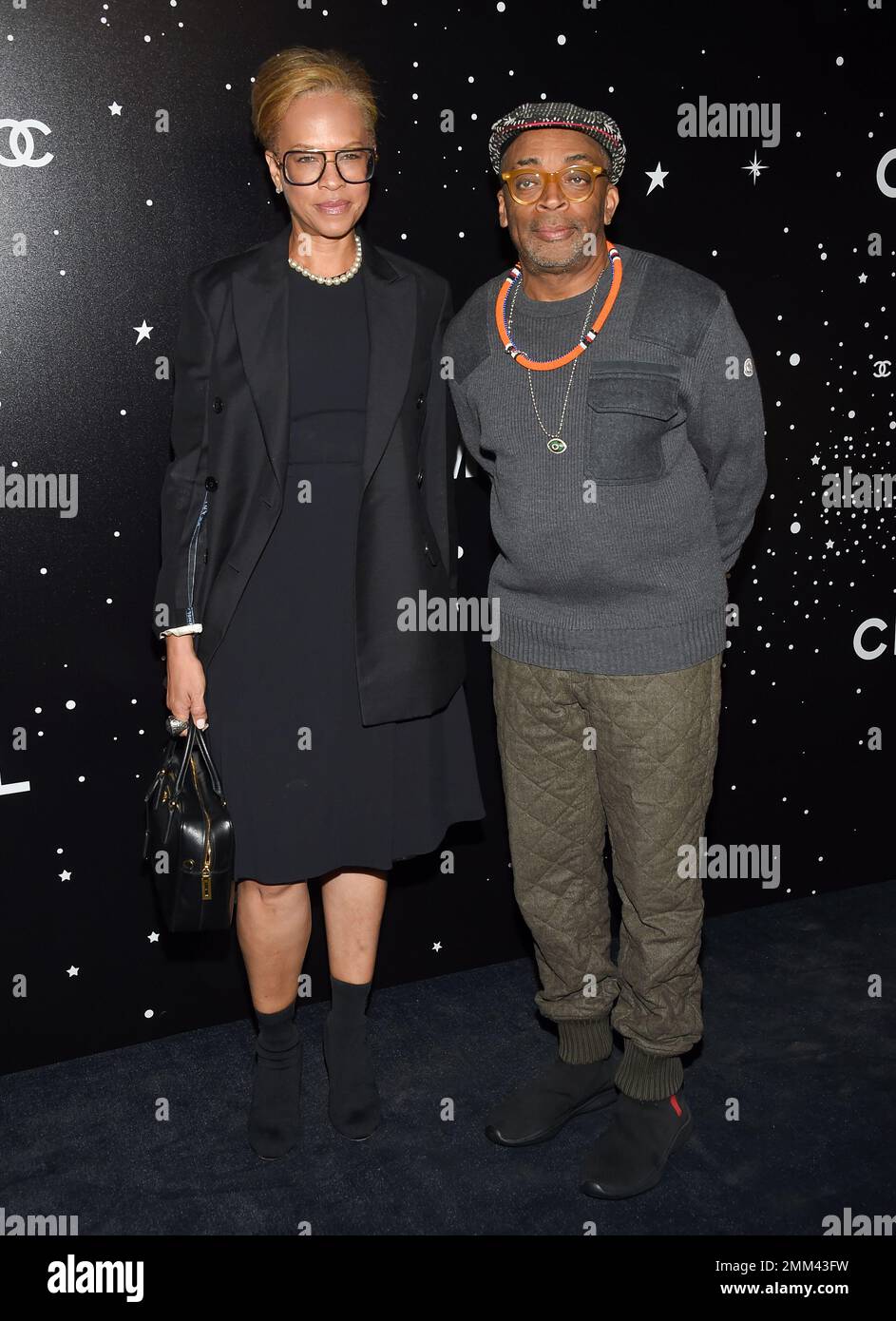 Filmmaker Spike Lee, right, and wife Tonya Lewis Lee attend the Museum ...