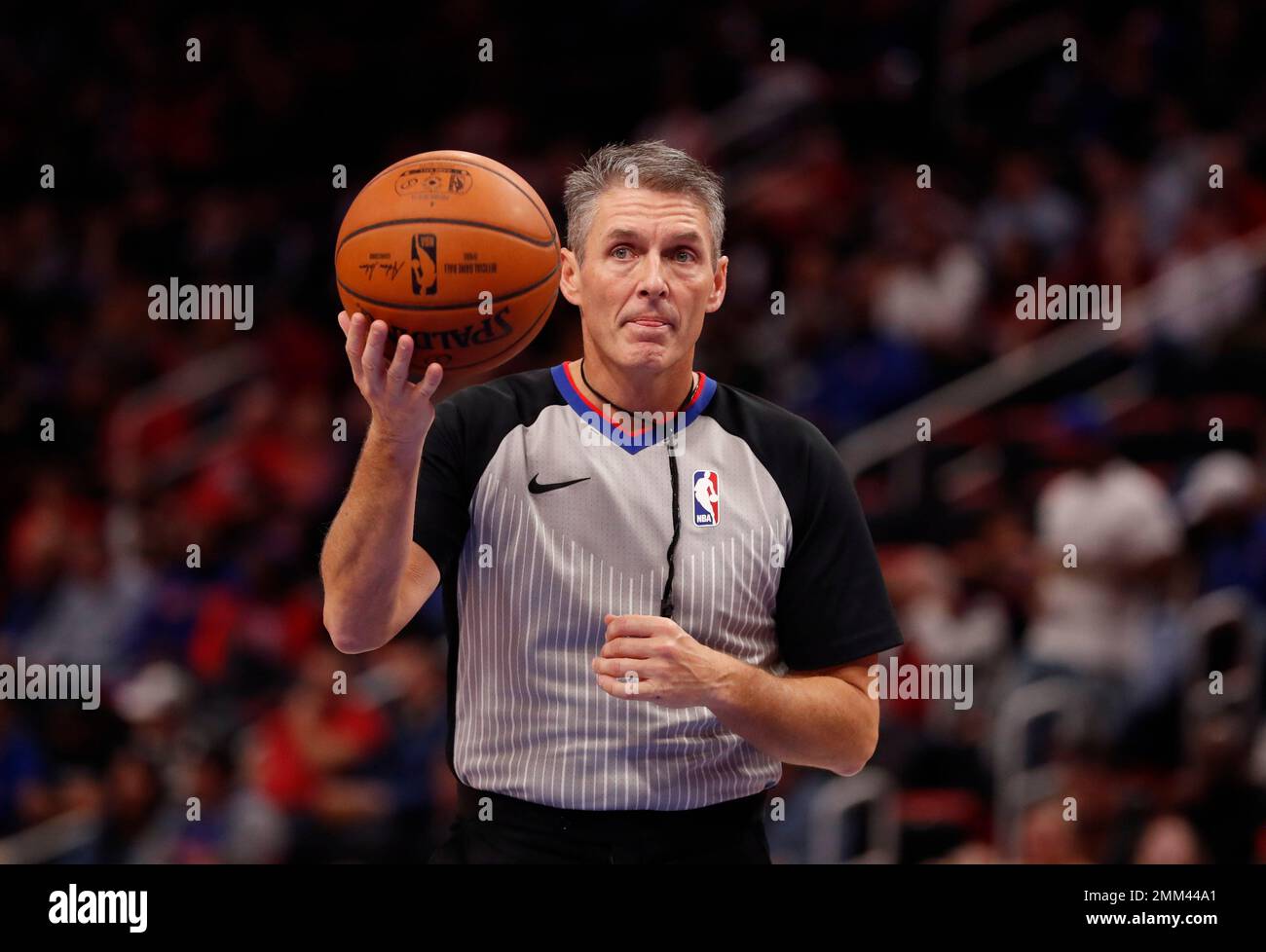 Referee Scott Foster prepares to put the ball in play during the first ...