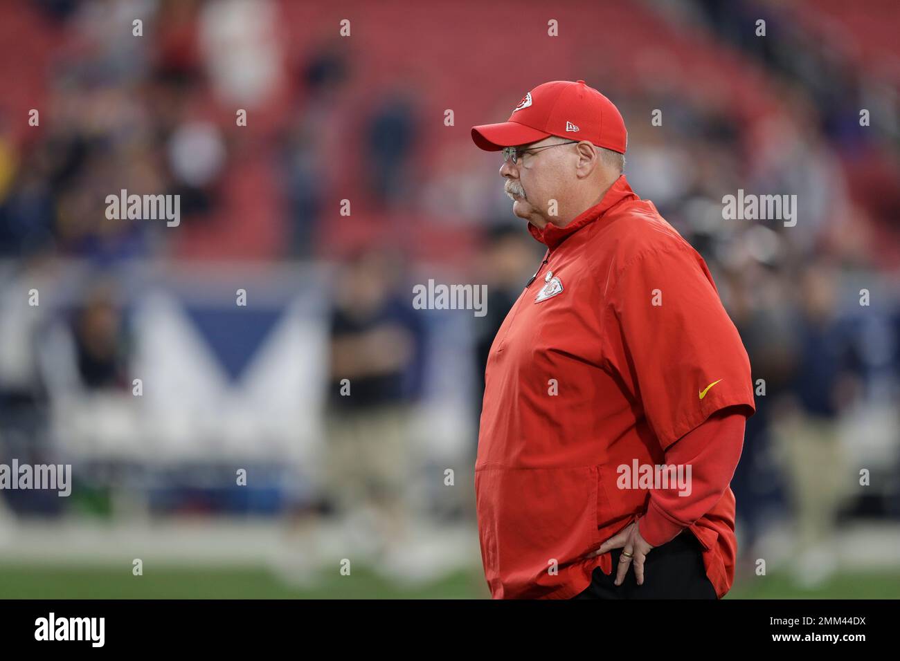 Kansas City Chiefs head coach Andy Reid stands on the field before an ...