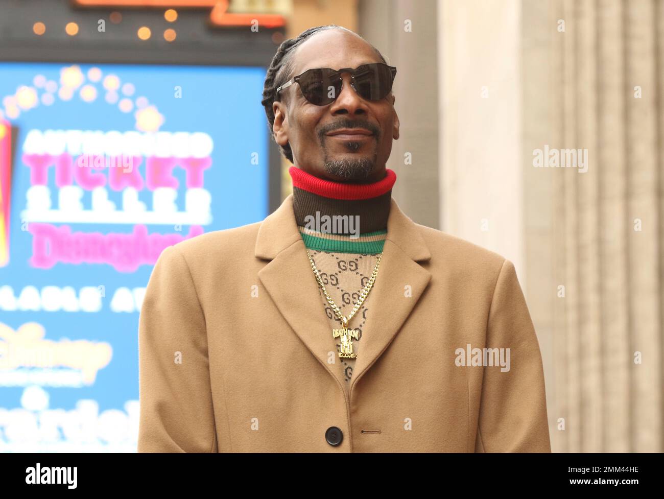 Rapper Snoop Dogg attends a ceremony honoring him with a star on the ...
