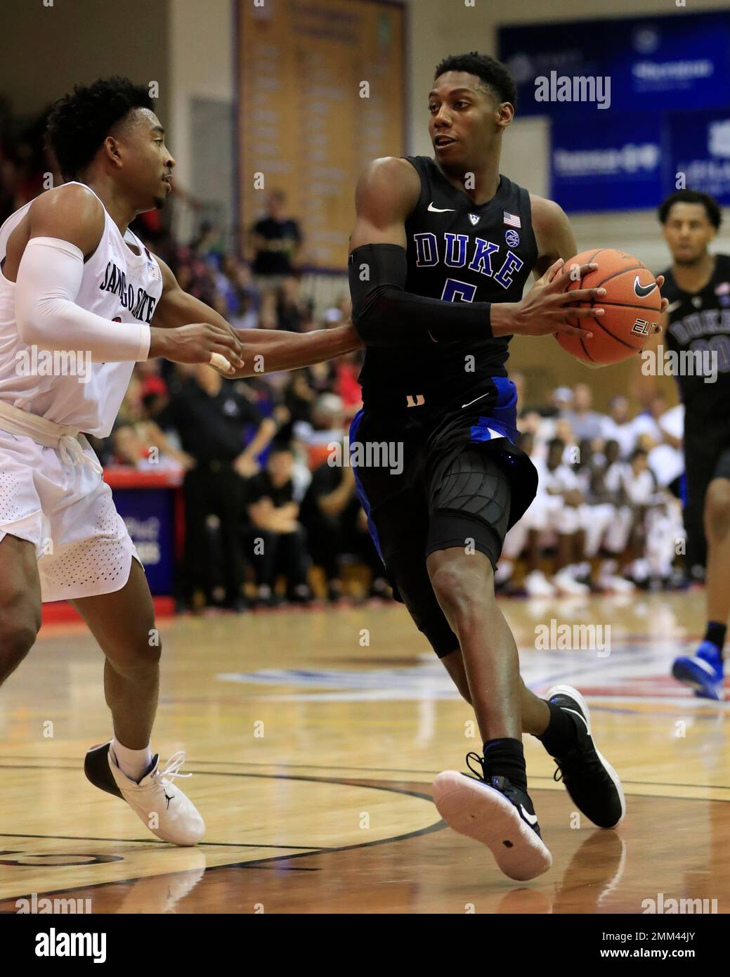 Duke forward RJ Barrett (5) dribbles past San Diego State guard Devin ...