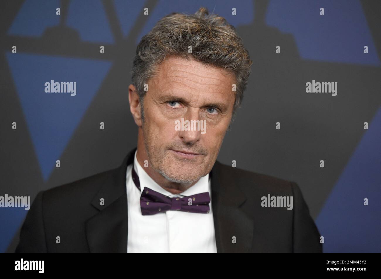 William Goldenberg arrives at the Governors Awards on Sunday, Nov. 18 ...