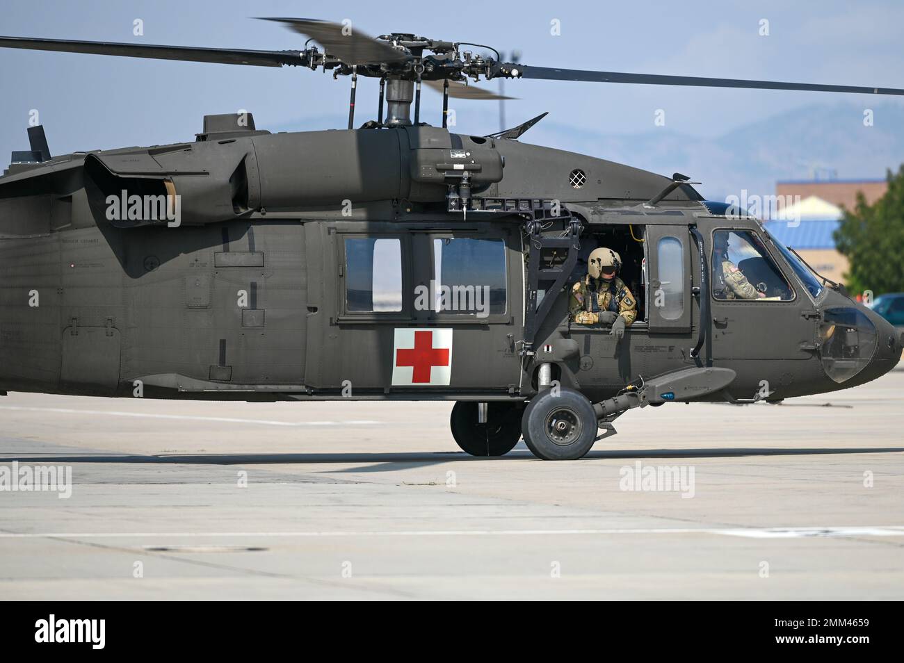 An Army National Guardsman prepares to park an HH-60G Pavehawk at Gowen ...
