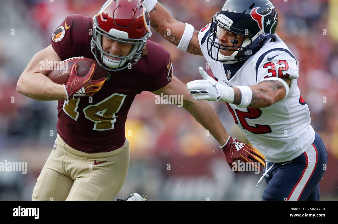 Washington Redskins wide receiver Trey Quinn (14) is chased by Houston ...