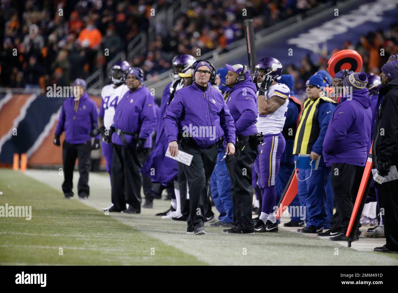 Minnesota Vikings head coach Mike Zimmer walks th e sidelines during ...