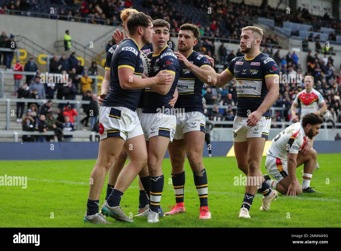 Joe Gibbons #33 of Leeds Rhinos celebrates his try and makes the score ...