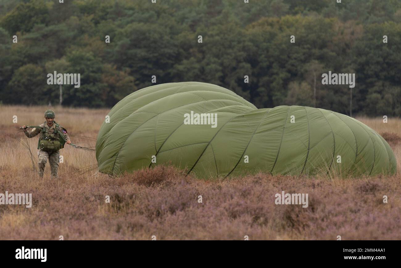 A U.S. Army Paratrooper gets dragged by his German T-10 parachute ...
