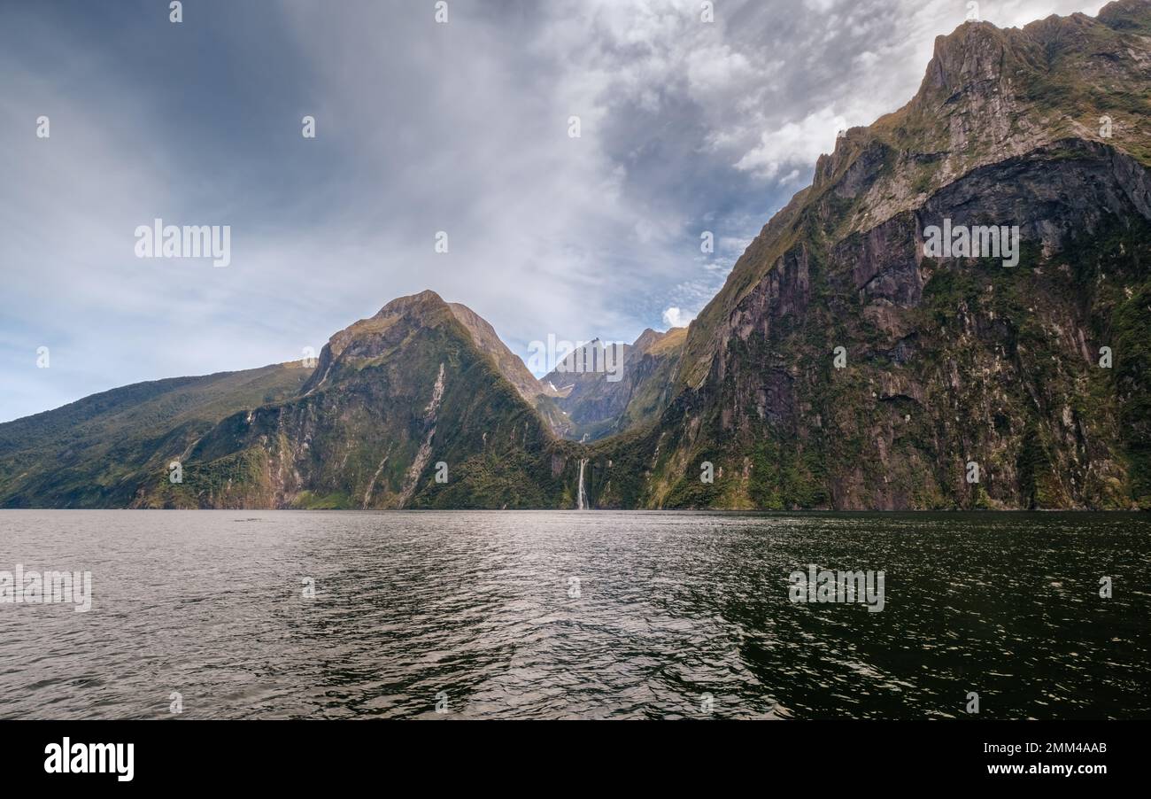 Stirling Falls cascading into Milford Sound on the South Island of New ...