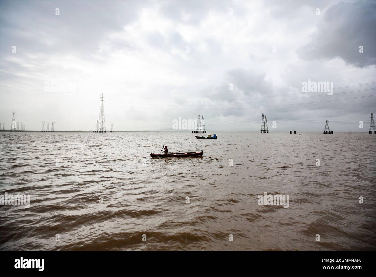 Fishing boats at work in the sea Stock Photo - Alamy