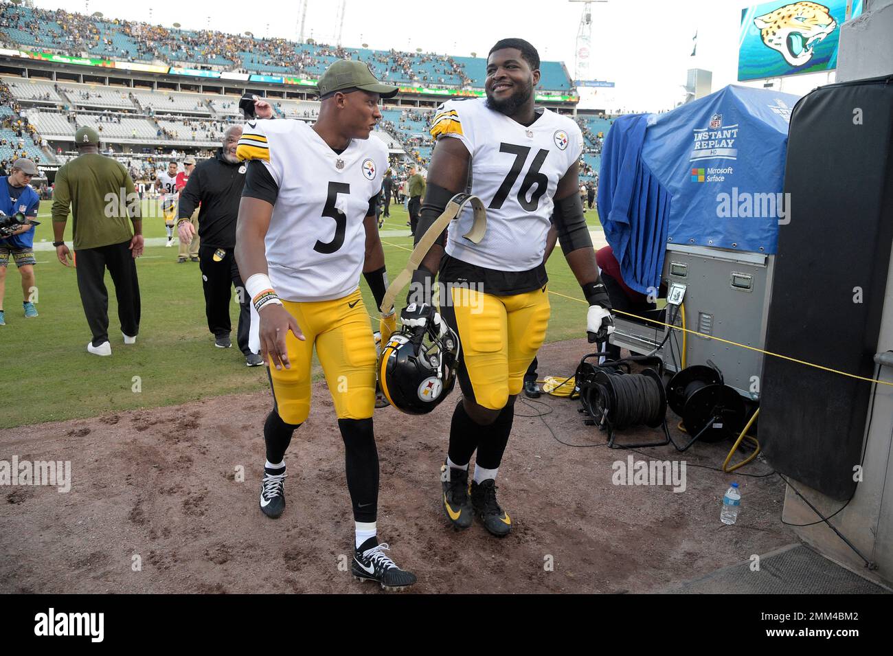 Pittsburgh Steelers quarterback Joshua Dobbs (5) and offensive tackle ...