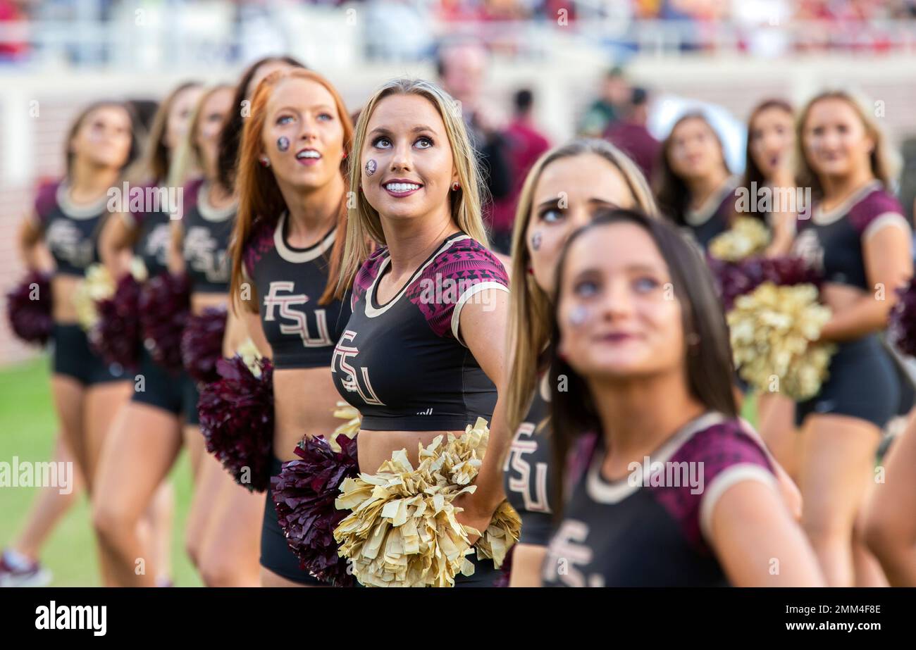 Florida State cheerleaders watch the the replay board in the second ...