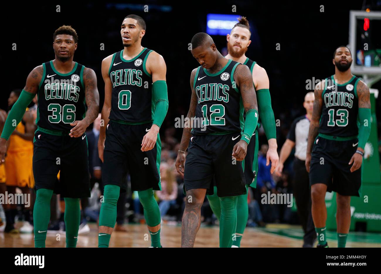 Boston Celtics' Marcus Smart (36), Jayson Tatum (0), Terry Rozier (12 ...