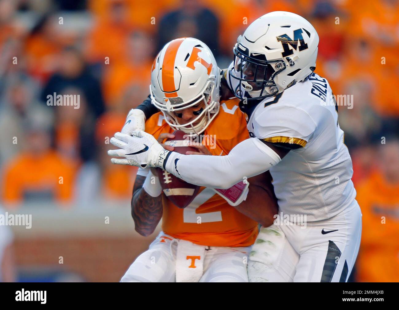 Tennessee quarterback Jarrett Guarantano (2) is sacked by Missouri ...