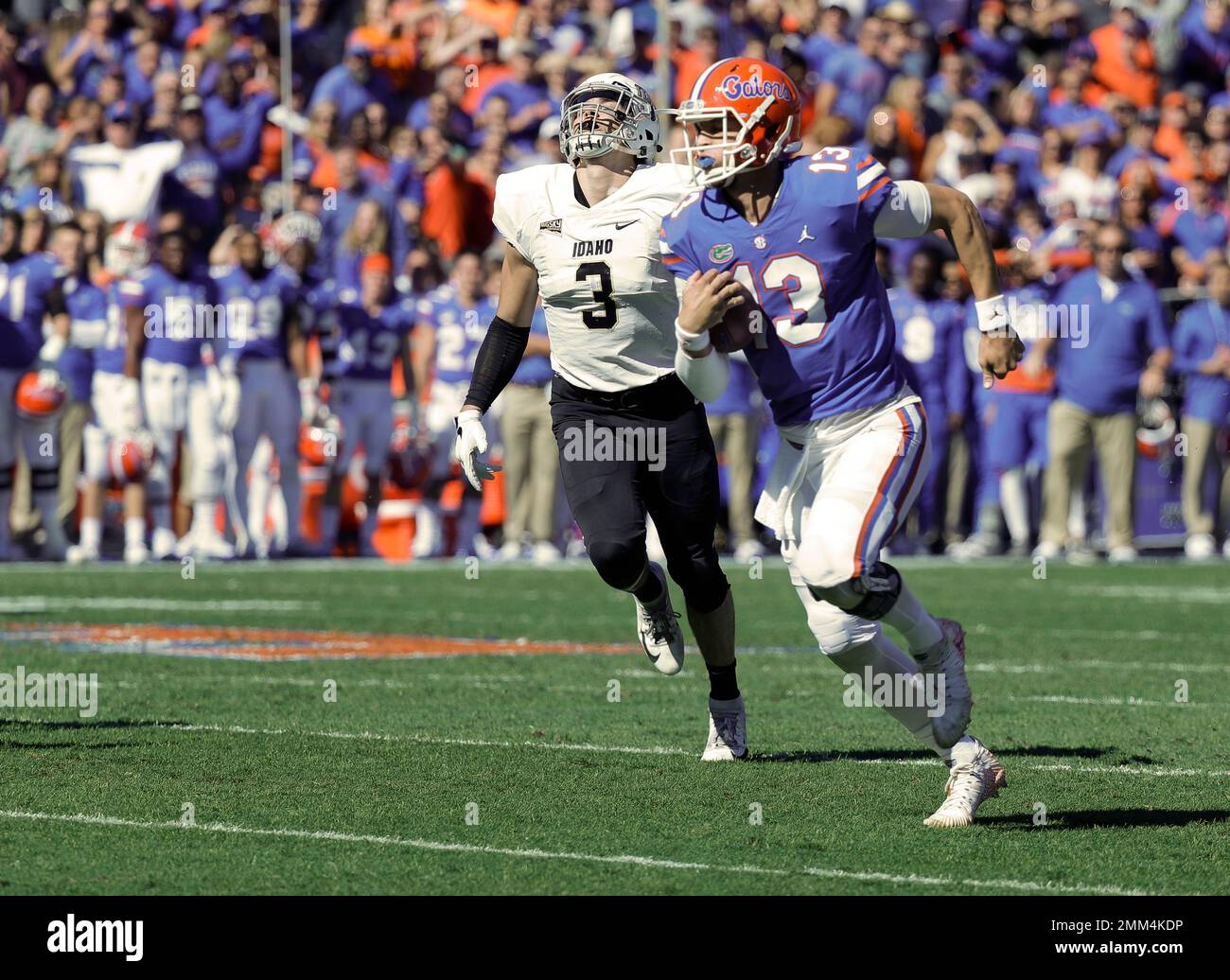 Florida quarterback Feleipe Franks, right, outruns Idaho linebacker ...