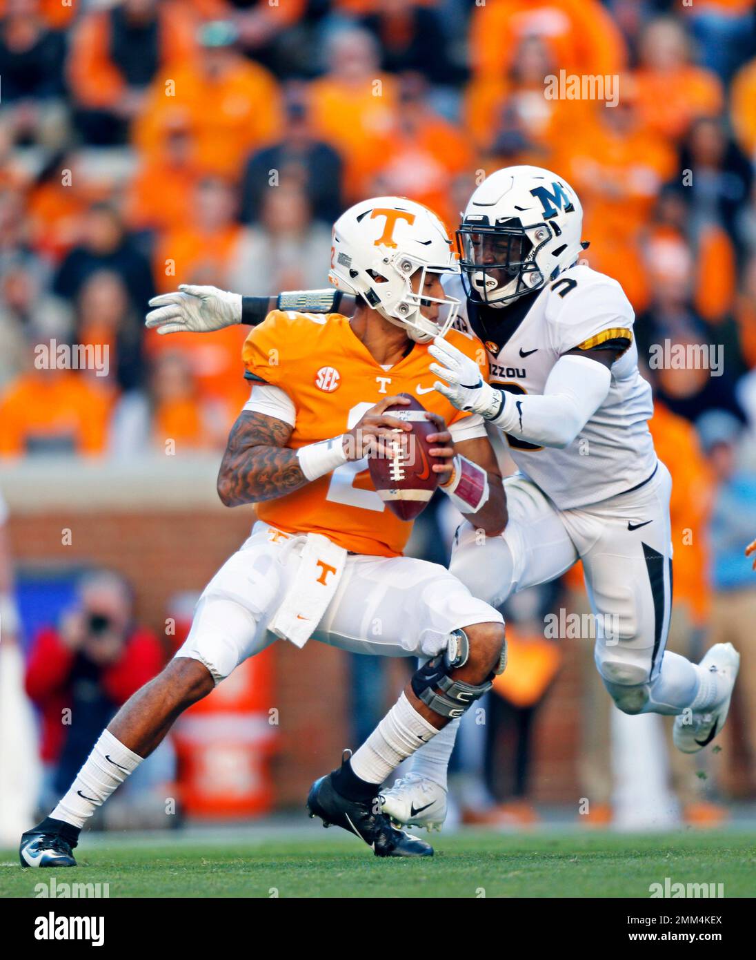 Tennessee quarterback Jarrett Guarantano (2) is sacked by Missouri ...