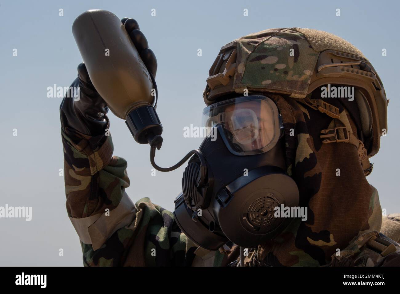 A U.S. Air Force 509th Bomb Wing Security Forces member, stays hydrated ...