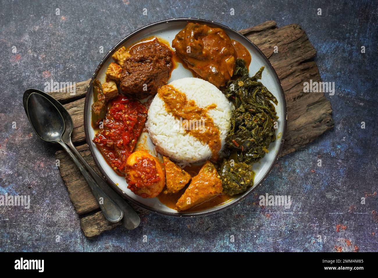 Famous traditional Indonesian food: Nasi Padang Stock Photo - Alamy