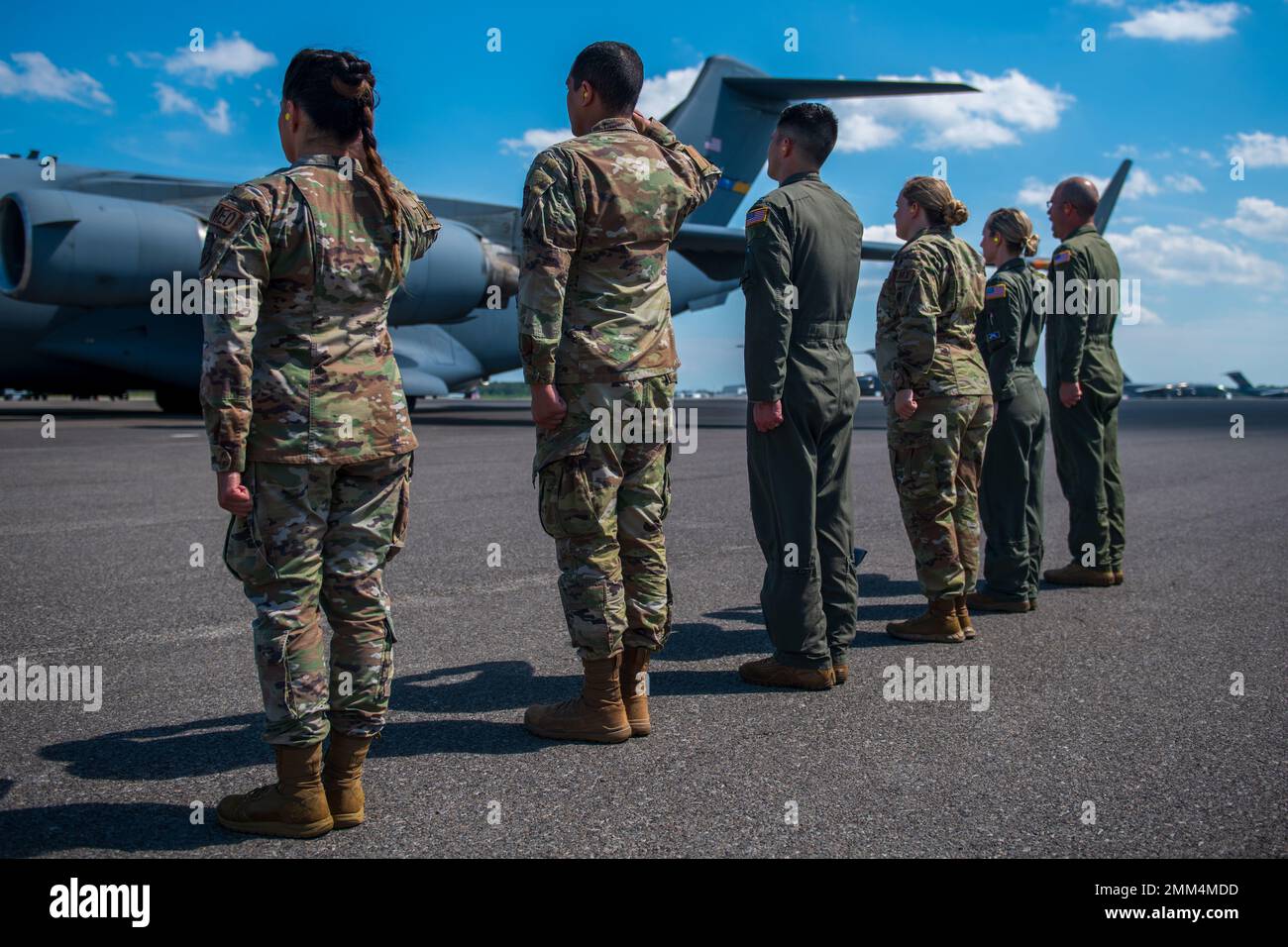 U.S. Air Force Airmen salute Maj. Gen. Corey J. Martin, 18th Air Force ...