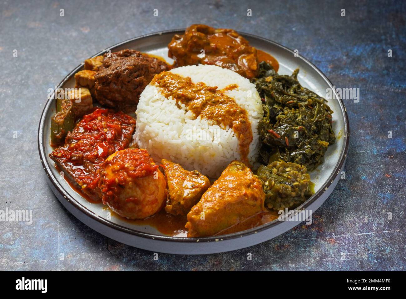 Famous traditional Indonesian food: Nasi Padang Stock Photo - Alamy
