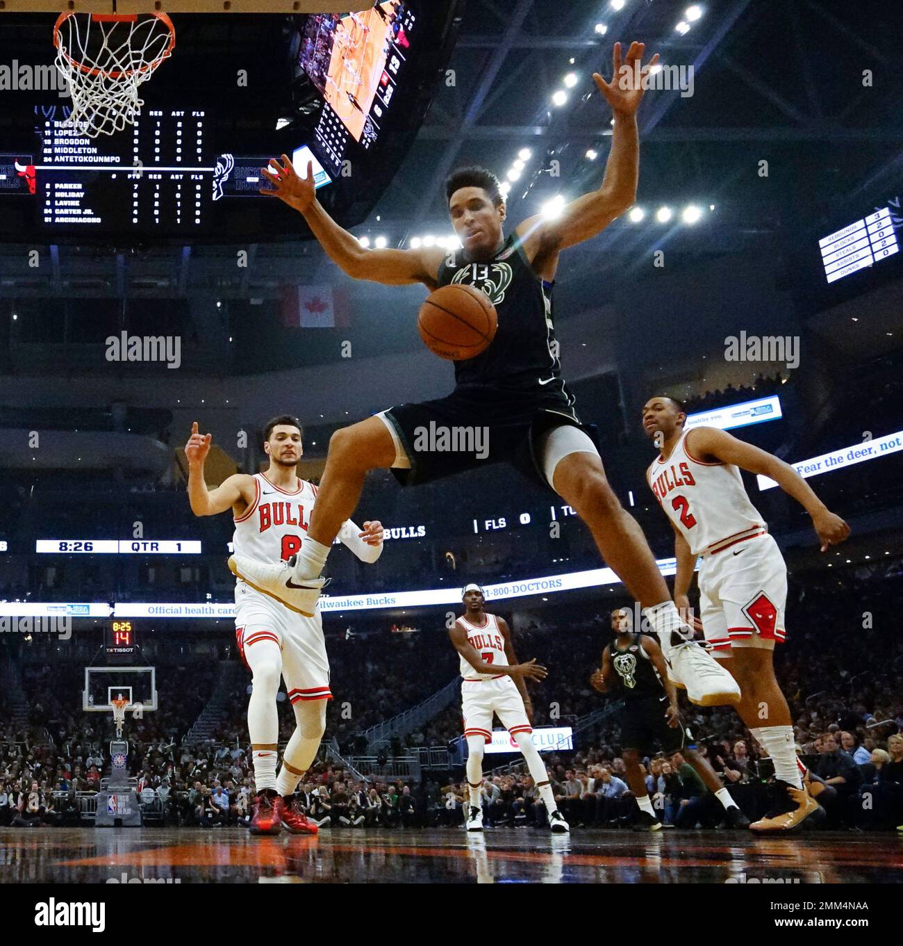 Milwaukee Bucks' Malcolm Brogdon reacts during the first half of an NBA ...