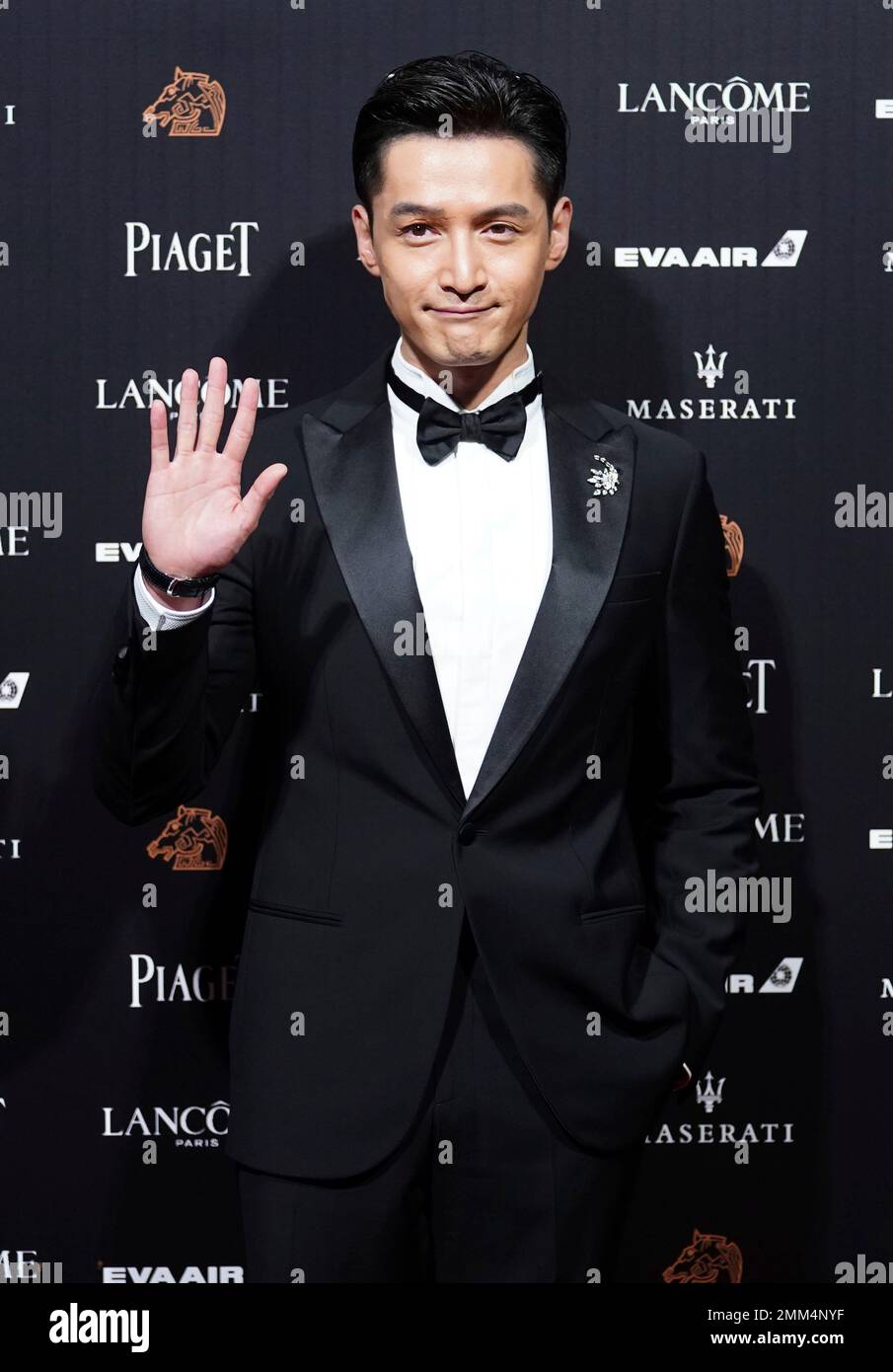Chinese actor Hugo Hu poses on the red carpet at the 55th Golden Horse ...