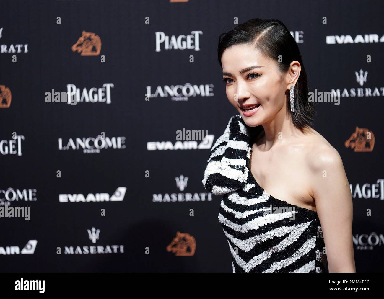 Taiwanese actress Jeannie Hsieh poses on the red carpet at the 55th ...