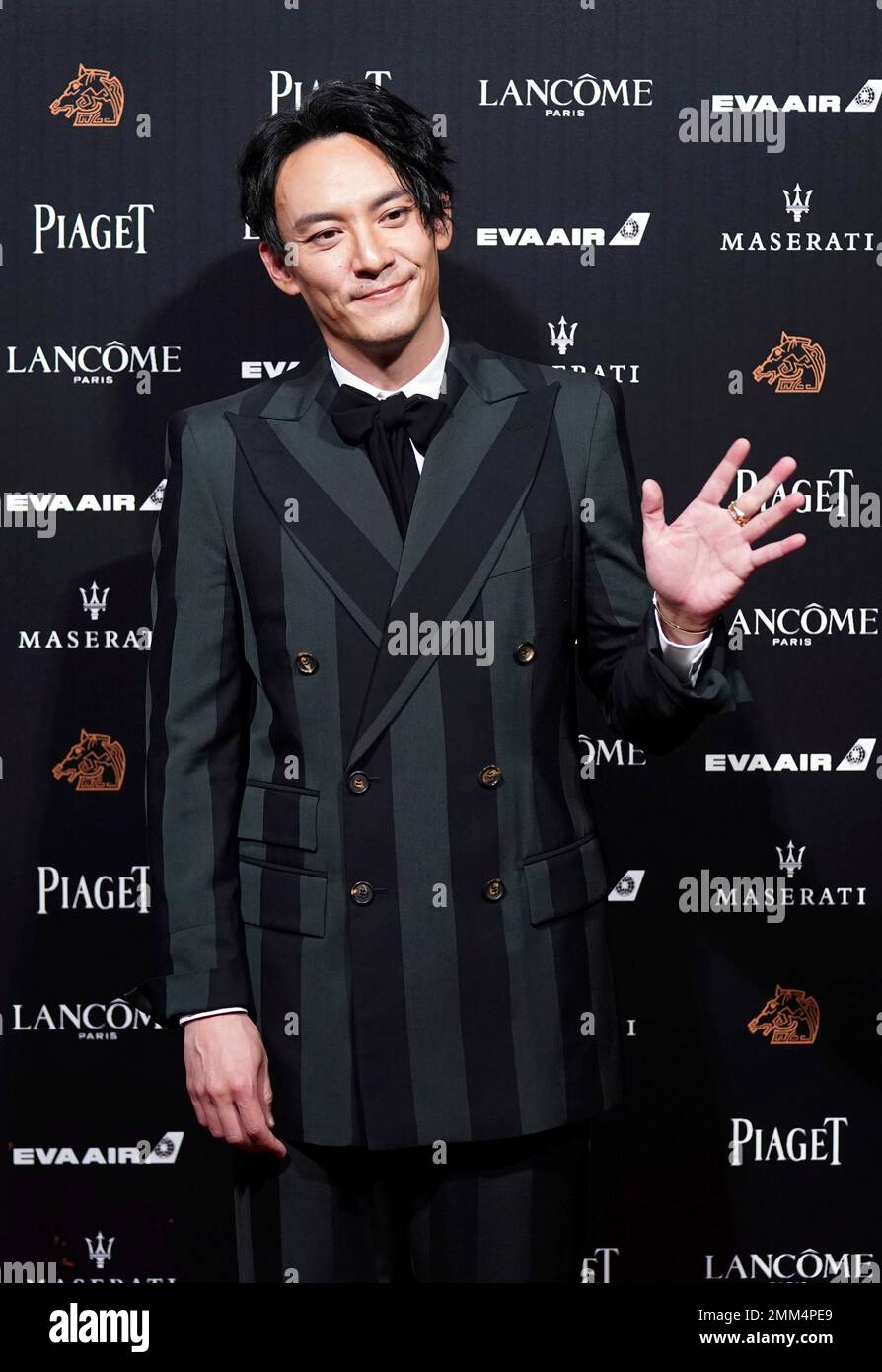 Taiwanese actor Chang Chen poses on the red carpet at the 55th Golden ...