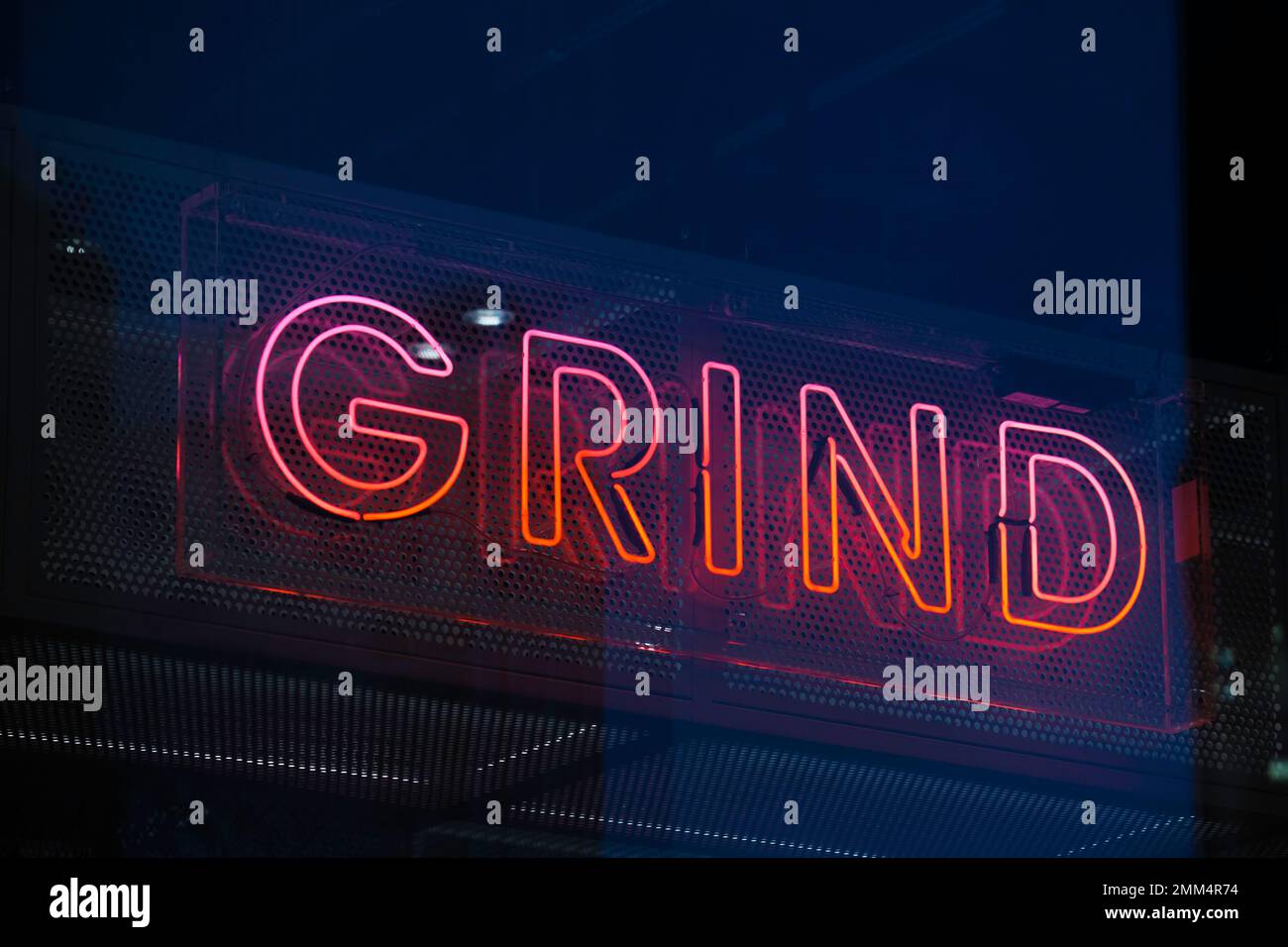 GRIND Neon sign for coffee house in Canary Wharf Stock Photo - Alamy