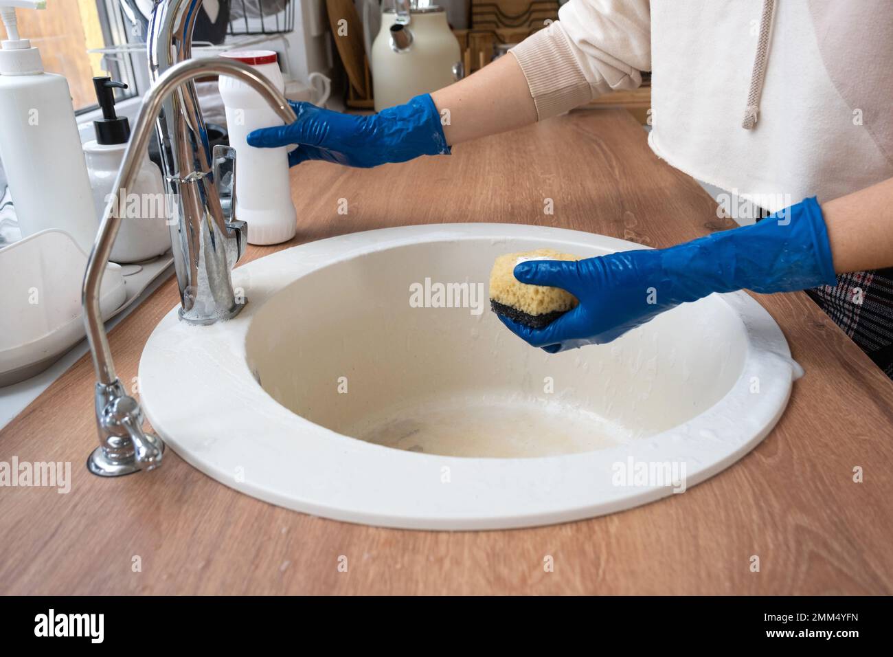 Retro hand washing at sink hi-res stock photography and images - Alamy
