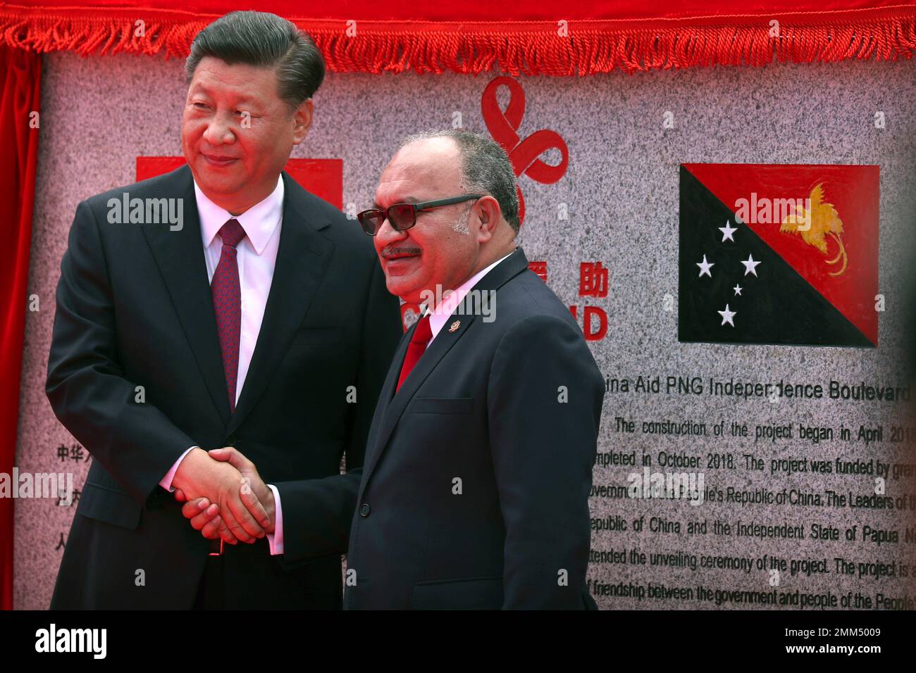 Chinese President Xi Jinping, left, and Papua New Guinea's Prime ...