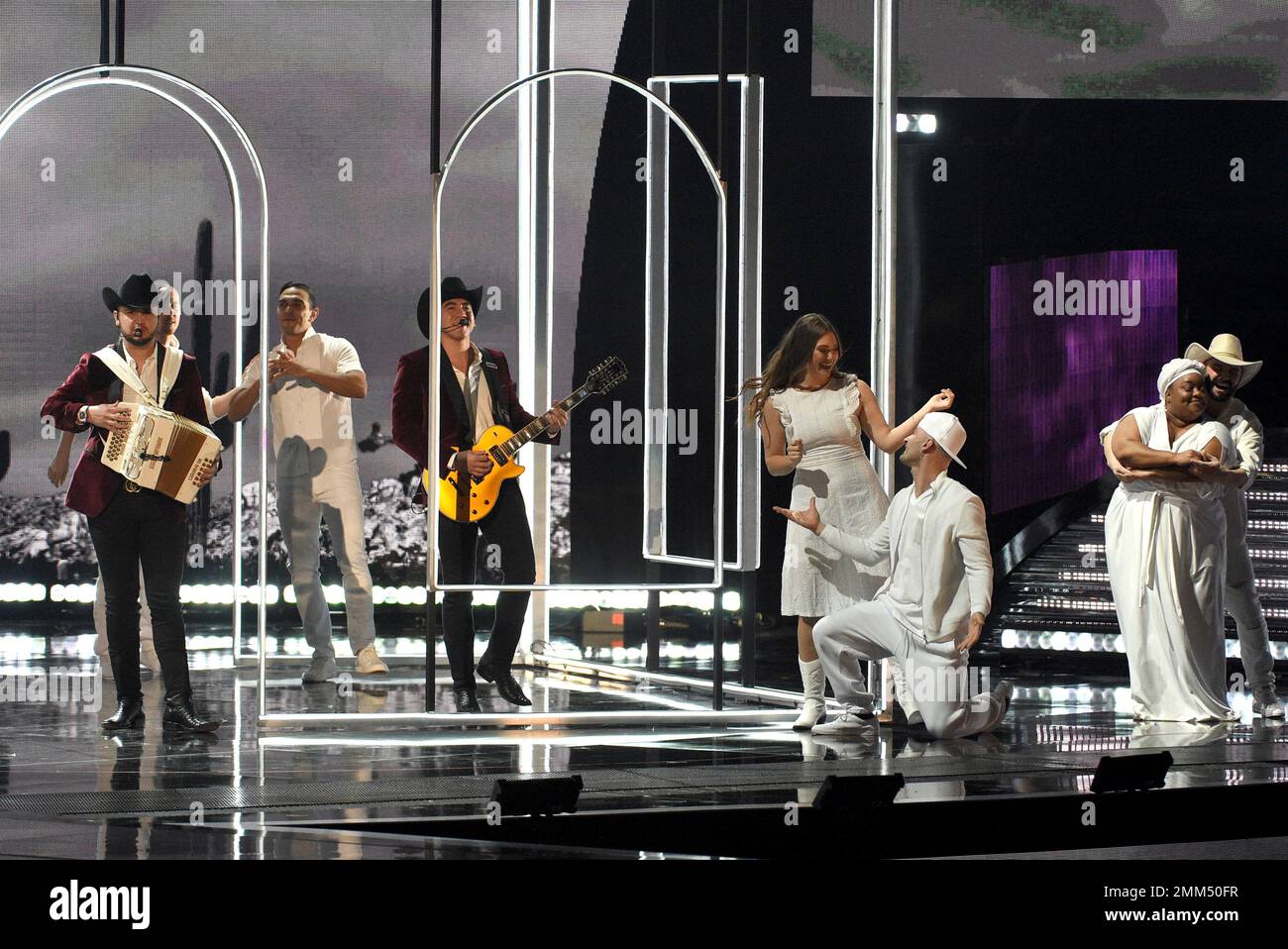 Eden Munoz, left, and Armando Ramos, of Calibra 50, perform "Corrido De ...