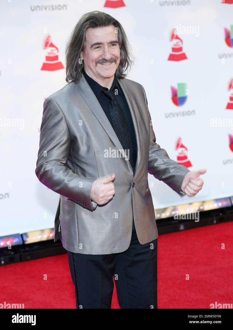 Luis Cobos, chairman of the Latin Grammy Foundation arrives at the ...