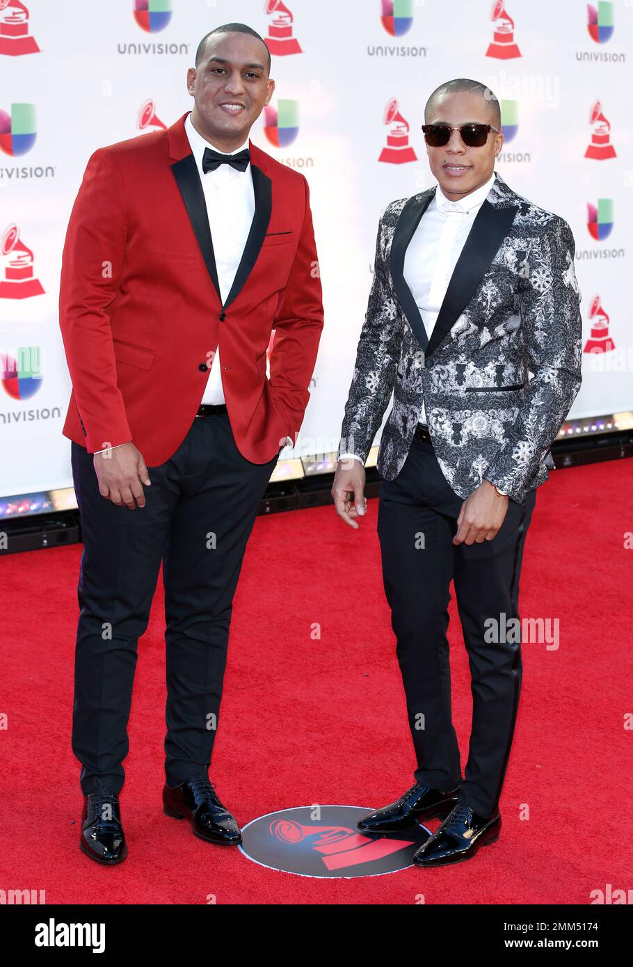Enmanuel Frias, left, and Rafael Berroa, of Chiquito Team Band, arrive ...