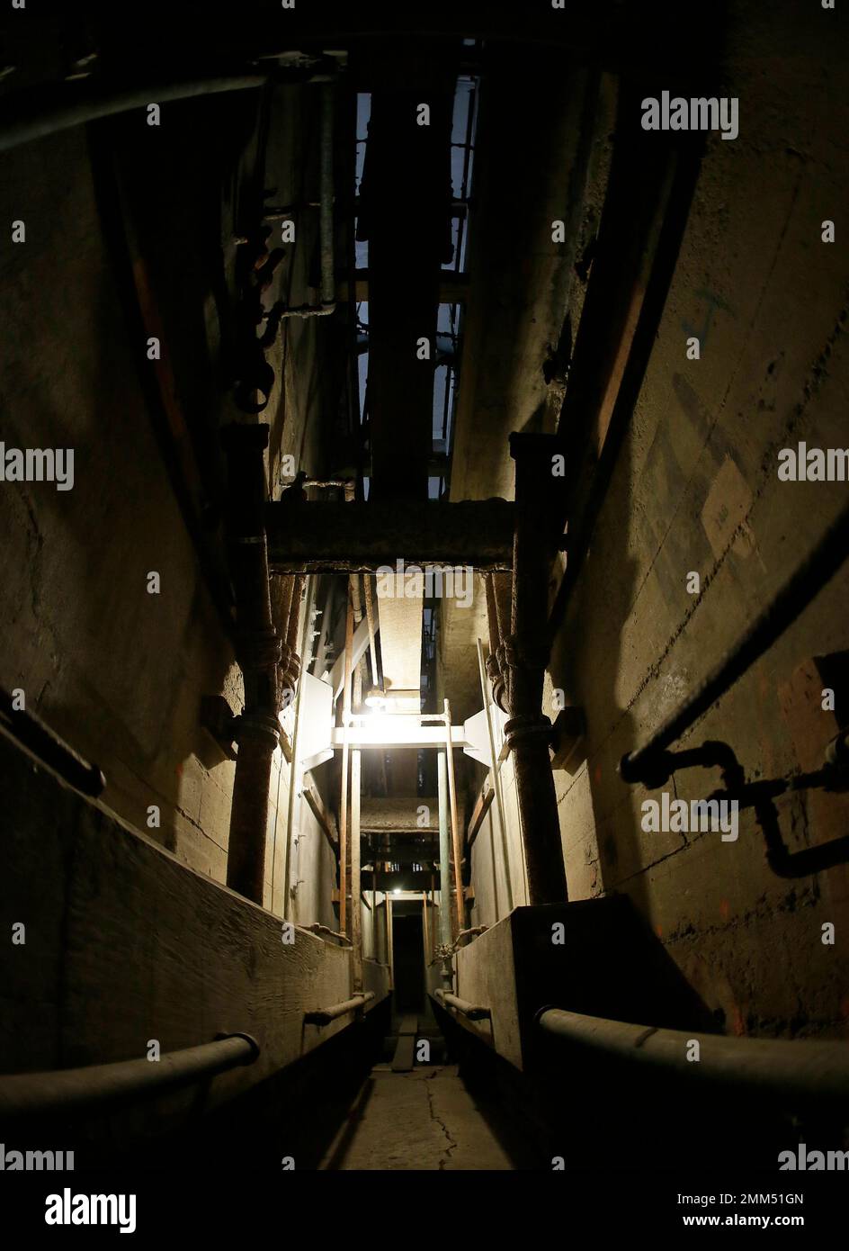 Shown is the area that prisoners climbed behind their cells to reach a ...