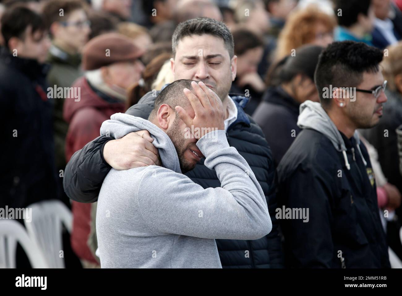 Relatives of the missing crew of the ARA San Juan submarine, embrace in ...
