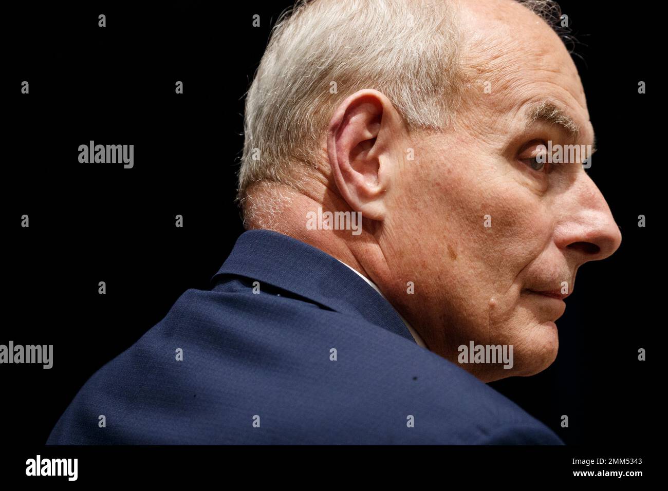 White House Chief of Staff John Kelly looks on as President Donald ...