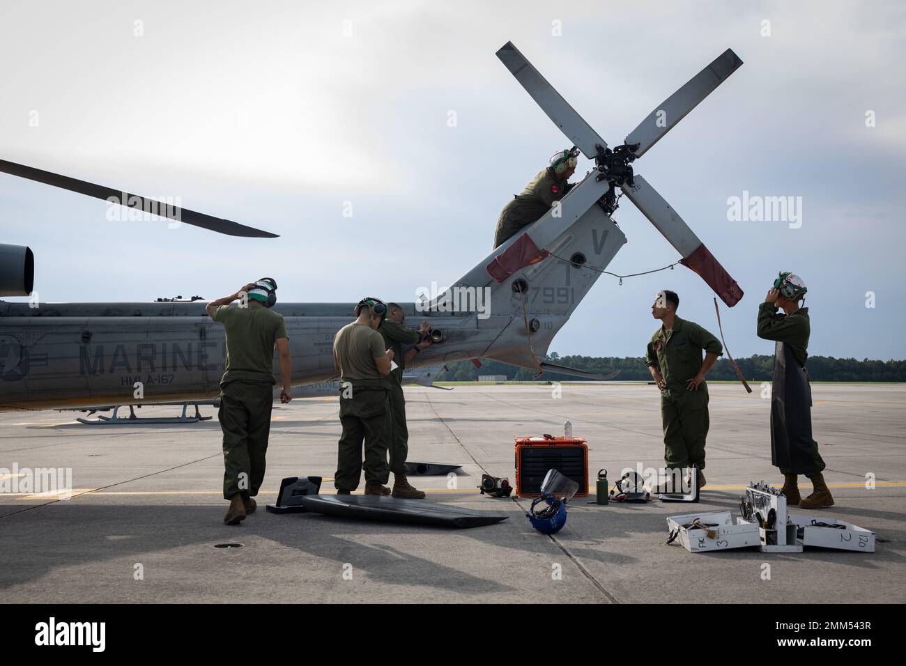 U.S. Marine Corps an aviation maintenance crew with Marine Light Attack ...