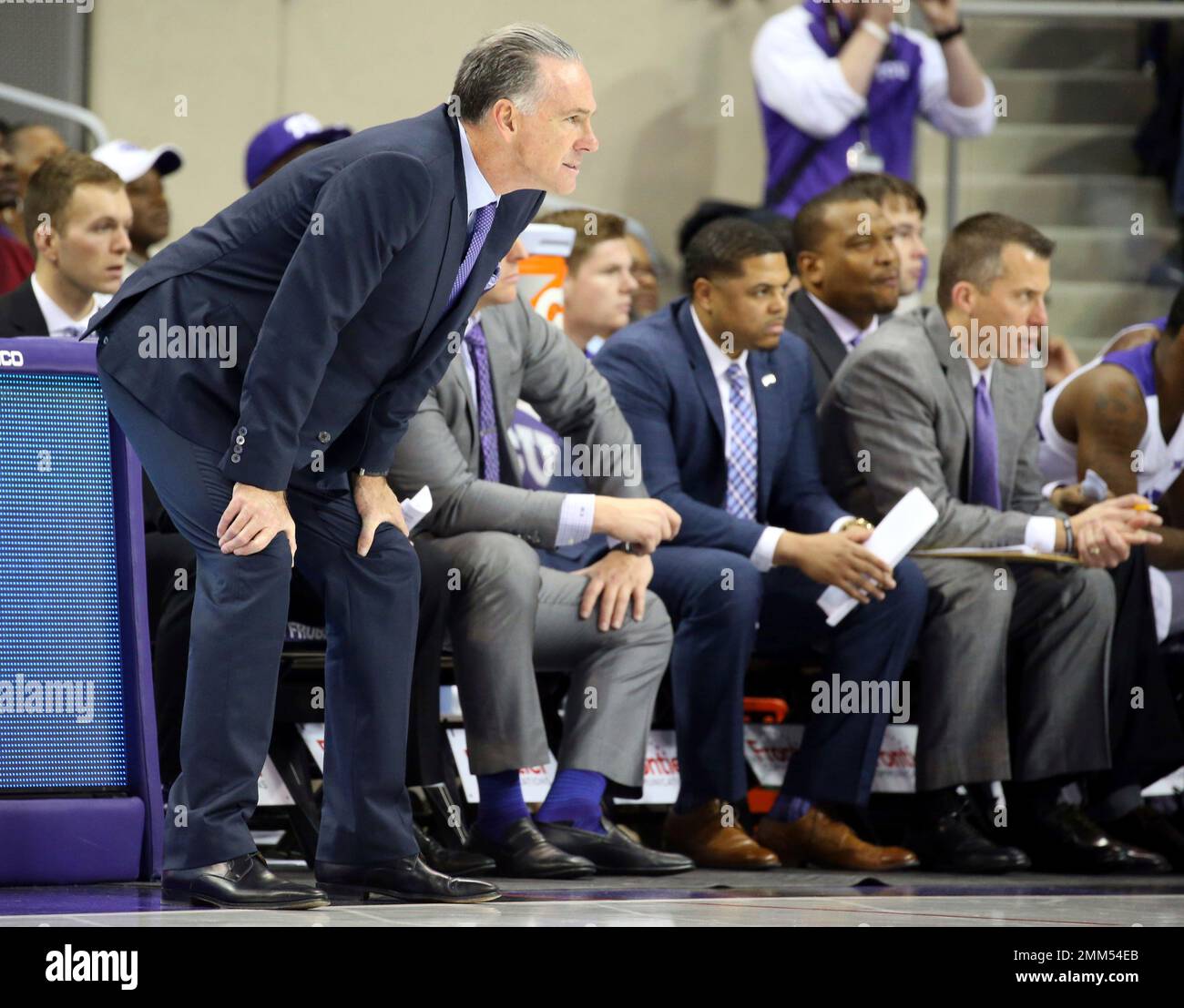 TCU head coach Jamie Dixon stands on the sideline as he coaches during ...