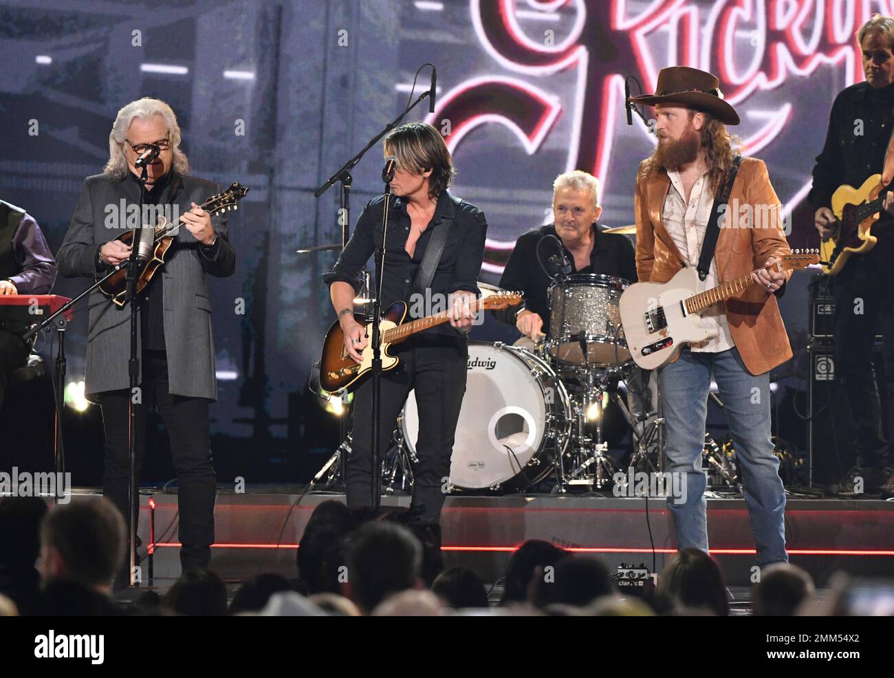Ricky Skaggs, from left, Keith Urban and John Osbourne perform at the ...