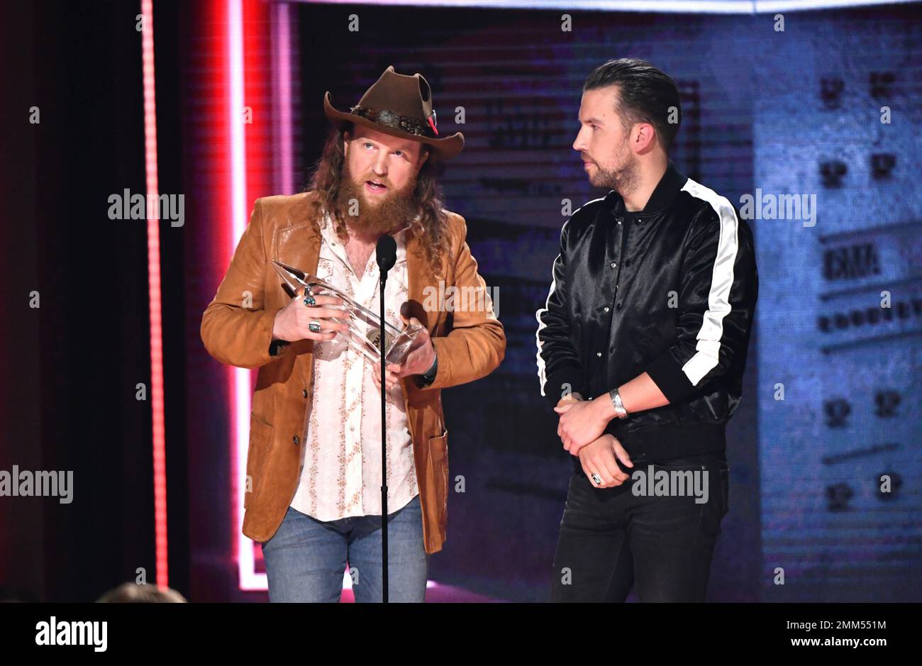 John Osborne, left, and T.J. Osborne of Brothers Osborne accept the ...