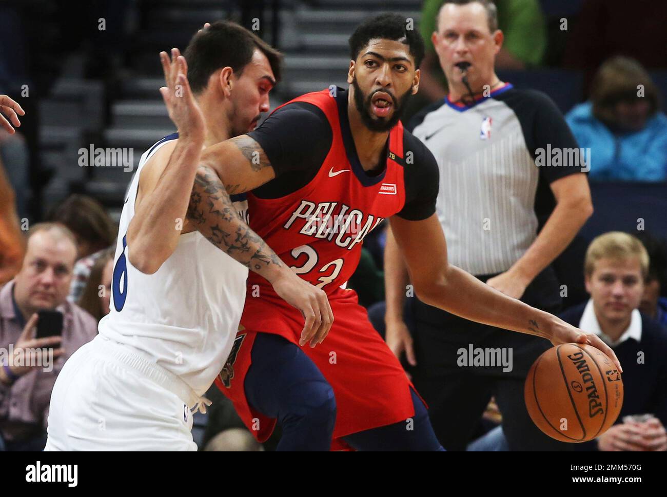 Minnesota Timberwolves' Dario Saric, left, of Croatia, works against ...