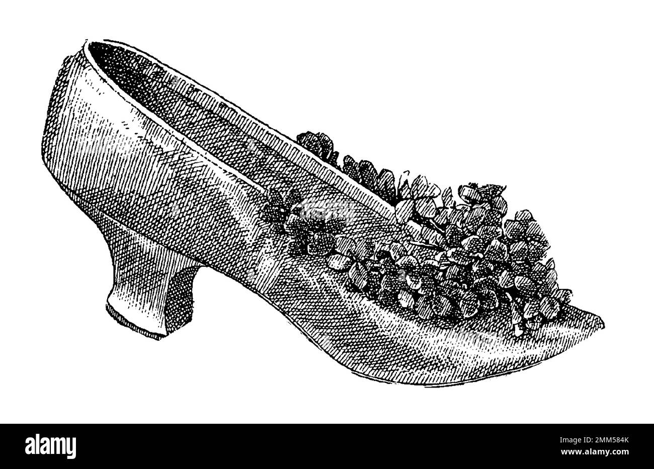 19th-century engraving of a Victorian shoe (isolated on white ...