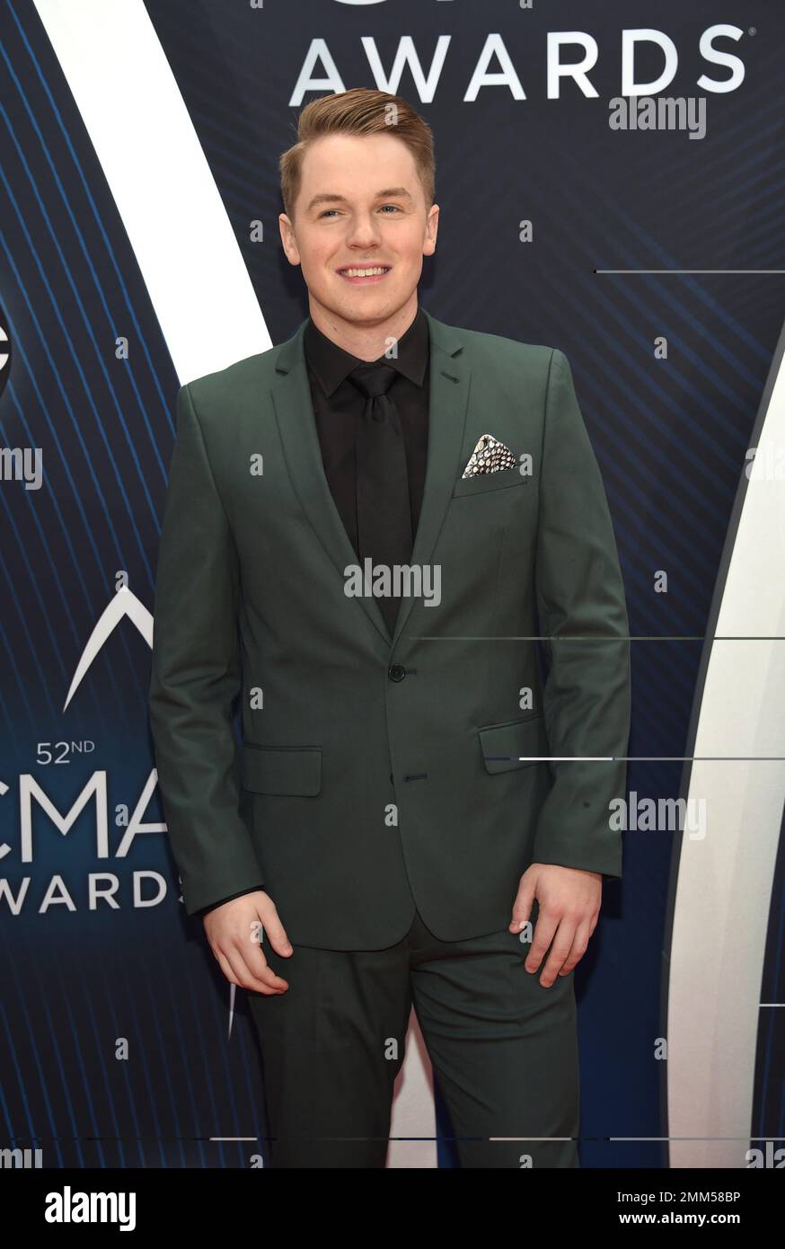 Travis Denning arrives at the 52nd annual CMA Awards at Bridgestone ...